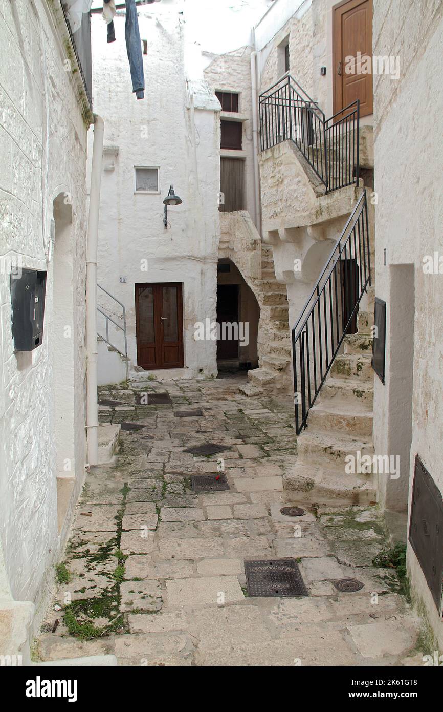 Cisternino, Puglia, Italy. Whitewashed stone buildings with outer ...