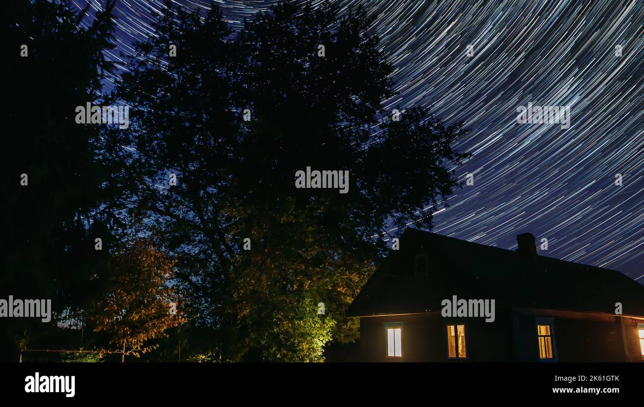 4k Hyperlapse. Dramatic Twilight Sky Spin Trails Of Stars On Night Sky ...