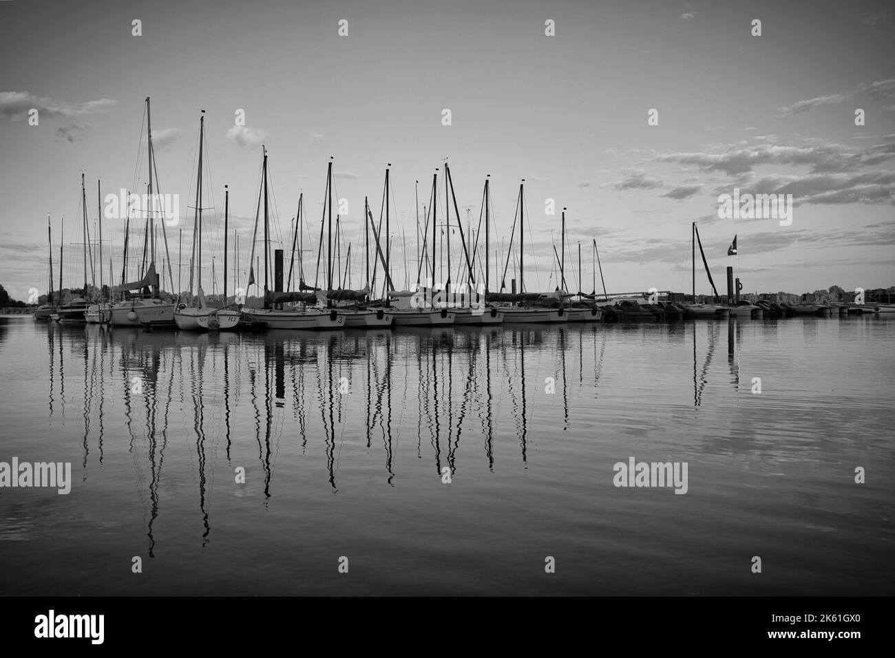 An aerial view of harbor with parked boats in black and white Stock ...