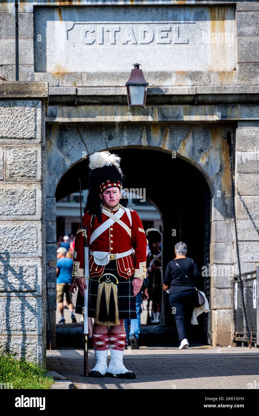 Halifax, Nova Scotia, Canada -- Sept 13, 2022. A guard in traditional ...