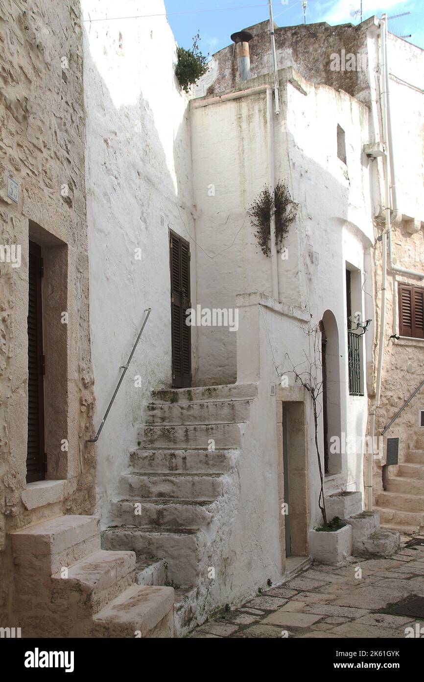 Cisternino, Puglia, Italy. Whitewashed stone buildings with outer ...