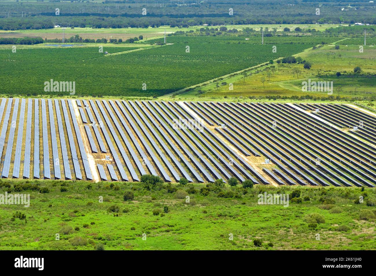 Aerial view of sustainable electric power plant between agricultural ...