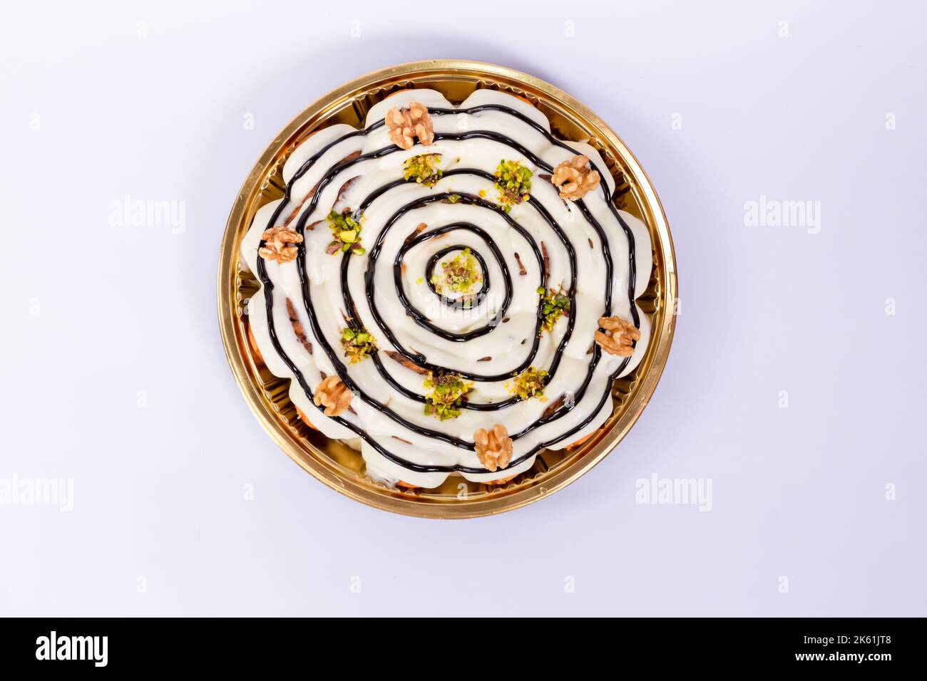 A round tasty Turkish delight pastry on a white background Stock Photo ...