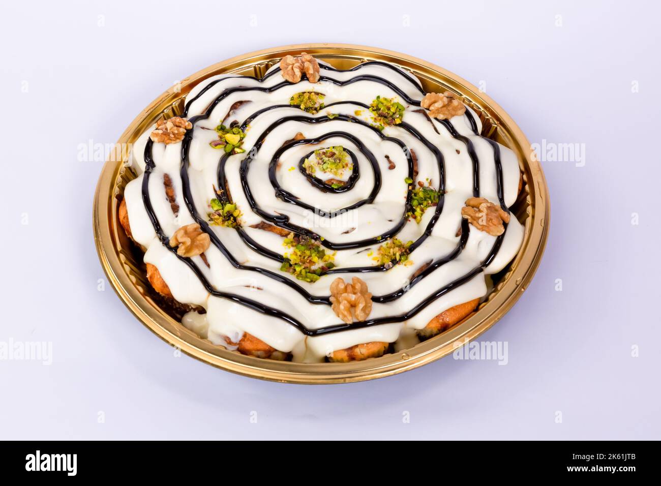 A round tasty Turkish delight pastry on a white background Stock Photo ...
