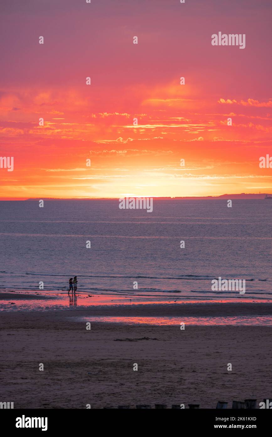 Sunset on Opal coast Stock Photo - Alamy