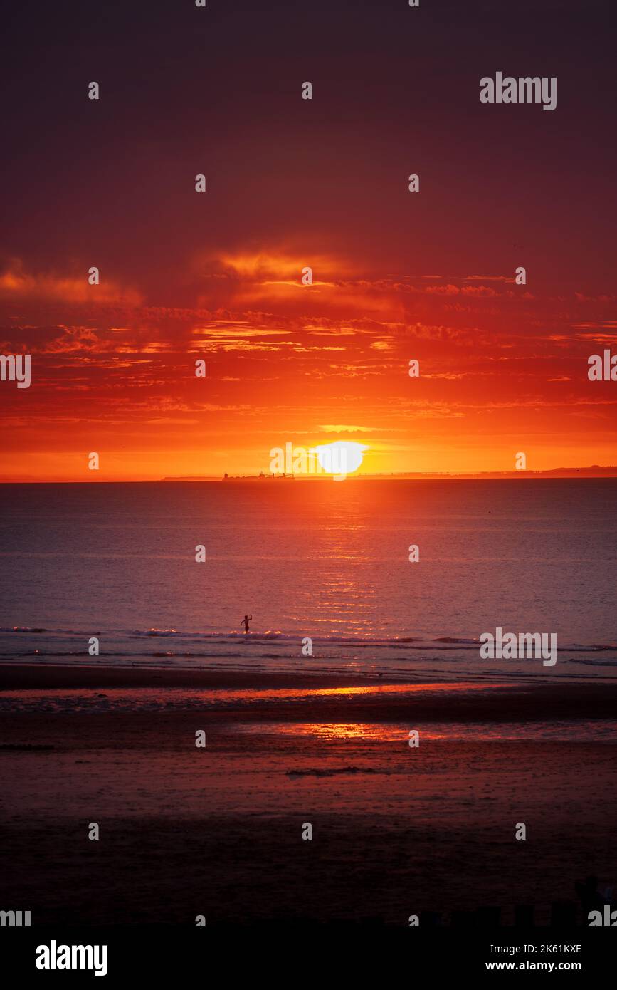 Fire on beach at sunset hi-res stock photography and images - Alamy