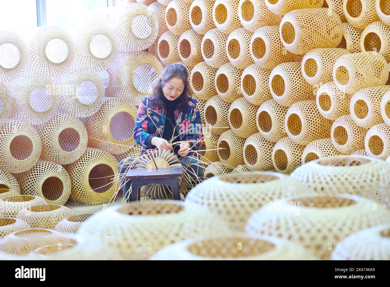 CHONGQING, CHINA - OCTOBER 11, 2022 - Workers weave antique lanterns at ...