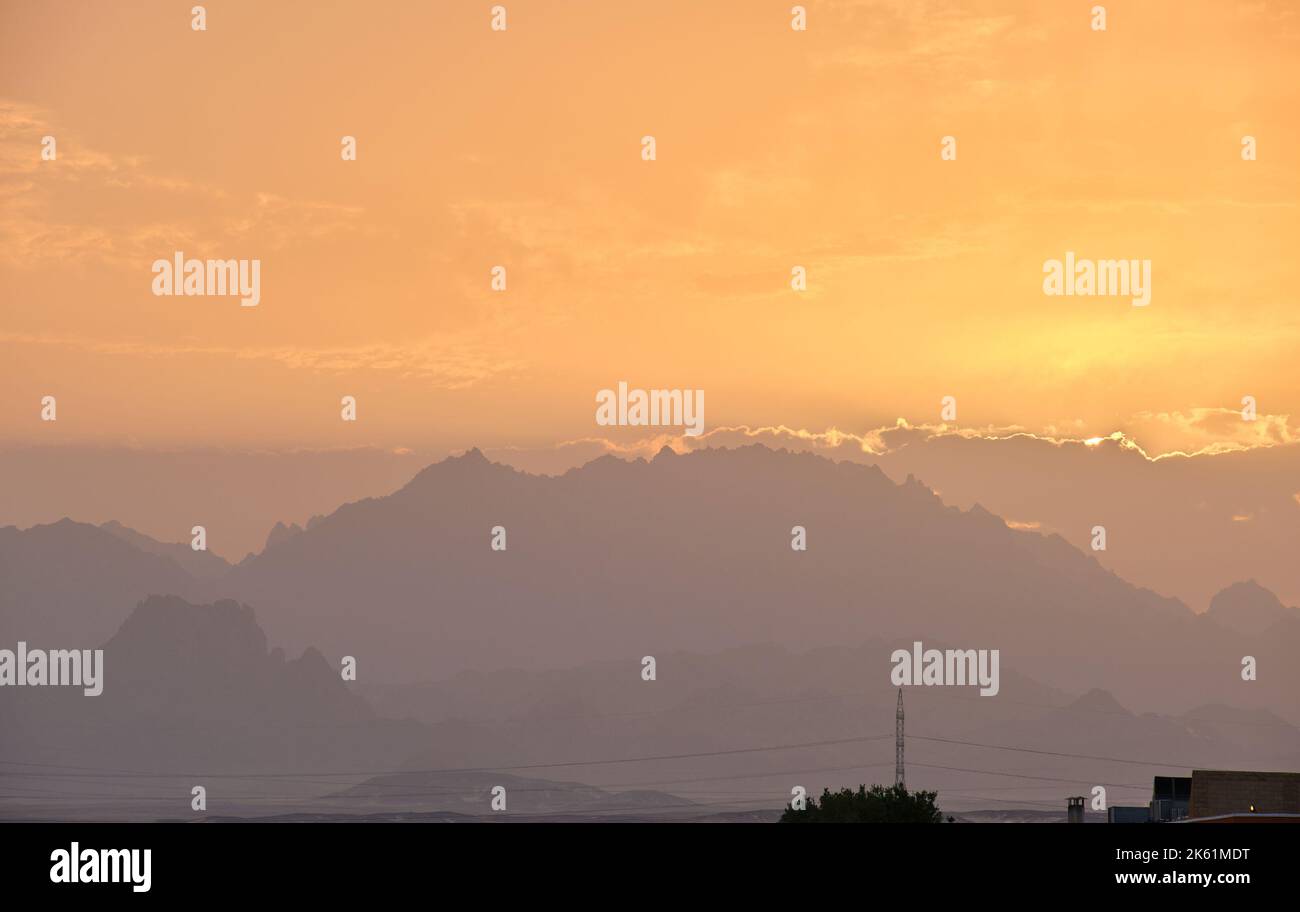 Sunset landscape with dark mountain peaks in egyptian desert Stock ...