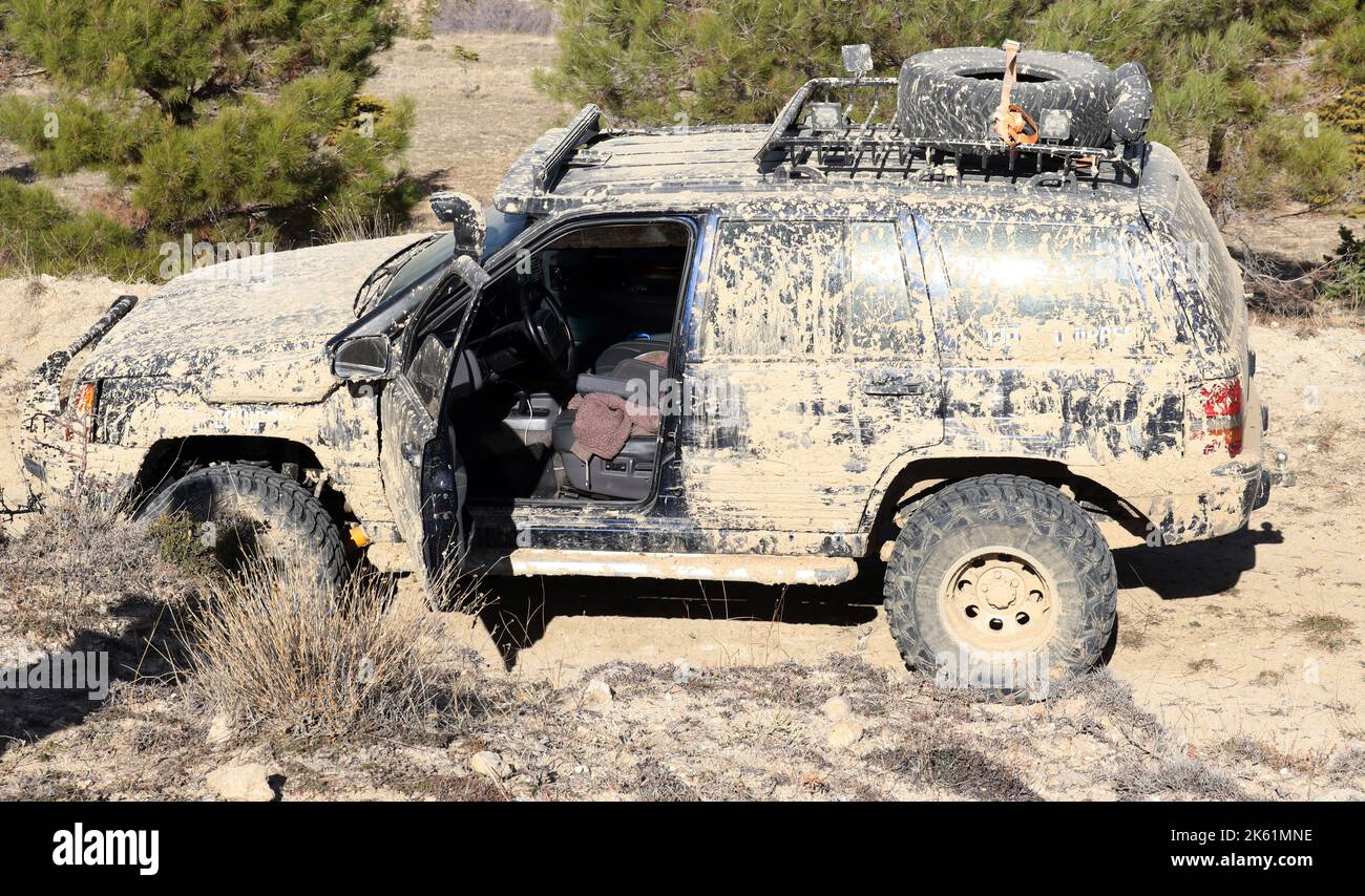 Off-road vehicle in muddy terrain Stock Photo - Alamy