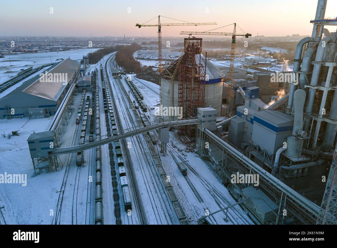 Aerial view of cargo train cars loaded with construction goods at ...