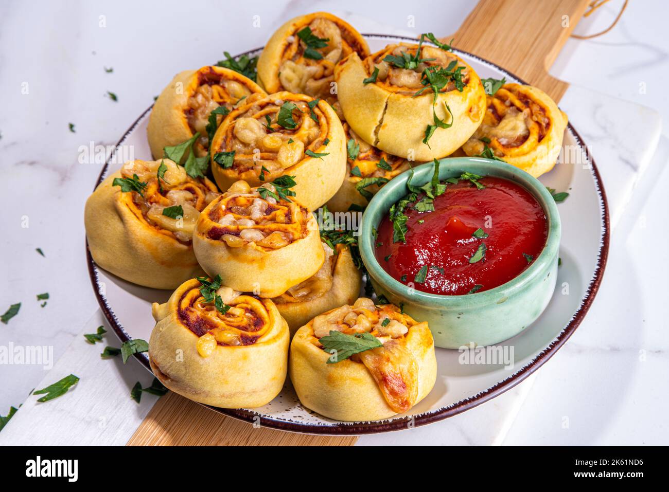 Homemade twisted Pizza rolls with tomato sauce, tomato, and cheese ...