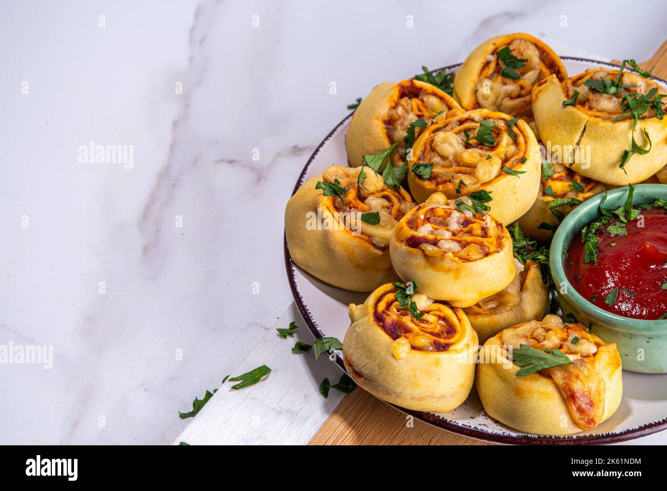 Homemade twisted Pizza rolls with tomato sauce, tomato, and cheese ...