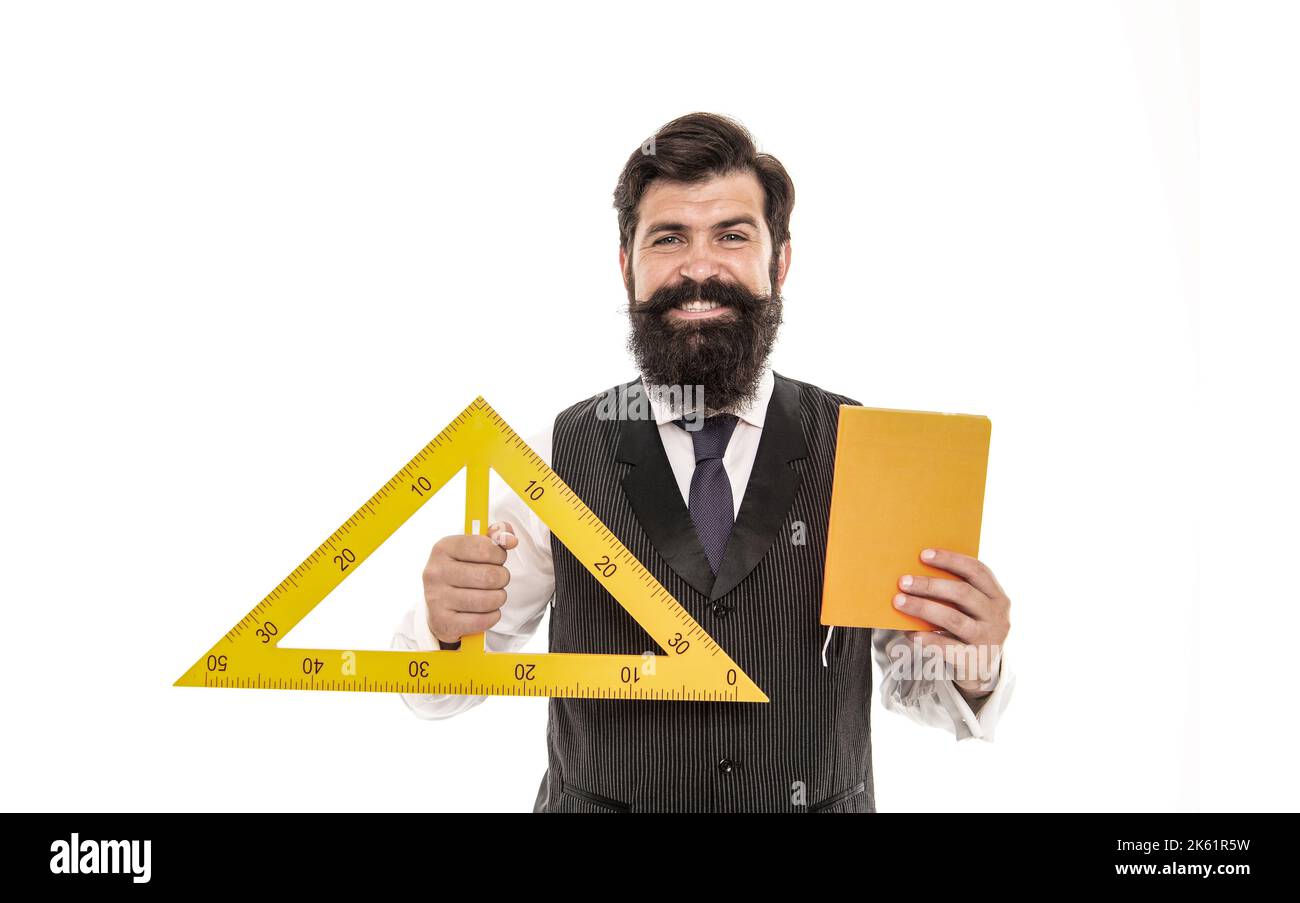 Teaching dimension in school. School teacher hold triangle and book ...