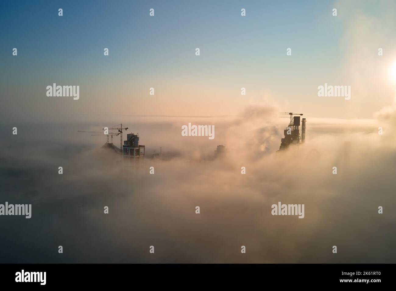 Aerial view of cement factory with high concrete plant structure and ...