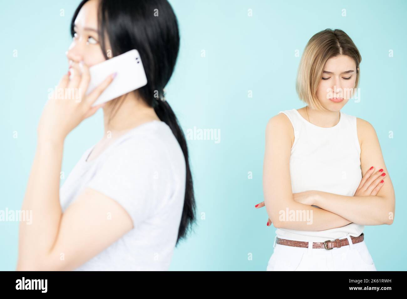 friendship problems unhappy woman jealousy Stock Photo - Alamy