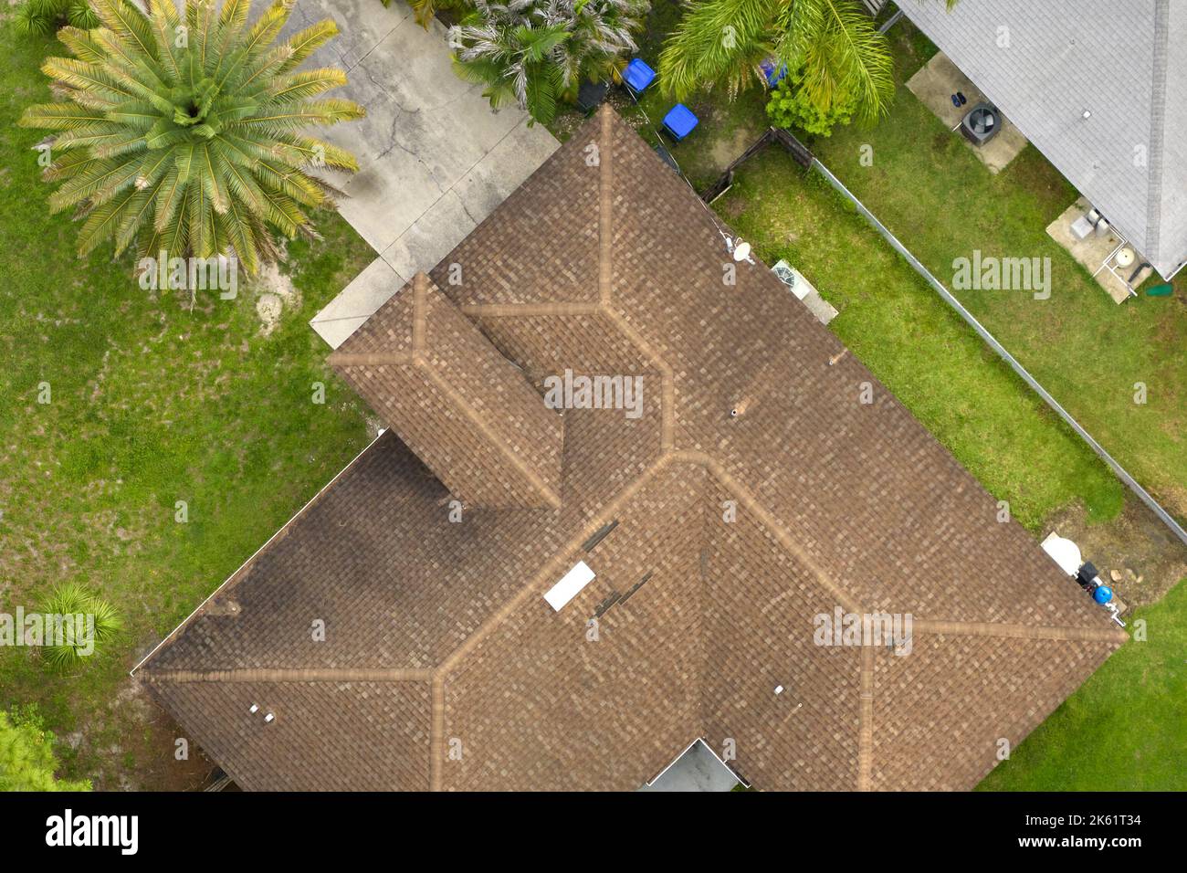 Aerial view of typical contemporary american private house with roof ...