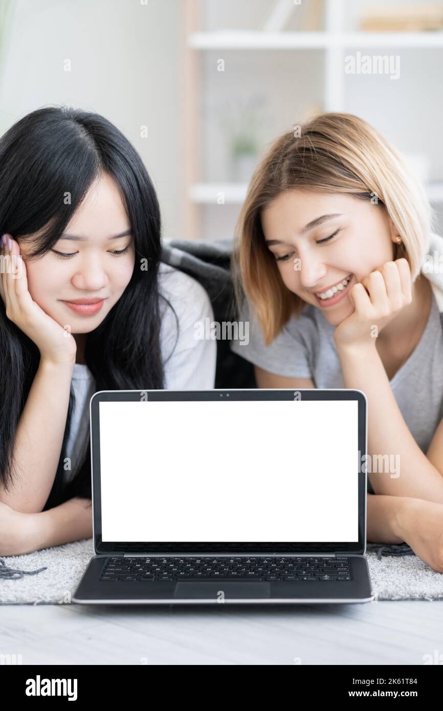friendly homework happy women online education Stock Photo - Alamy
