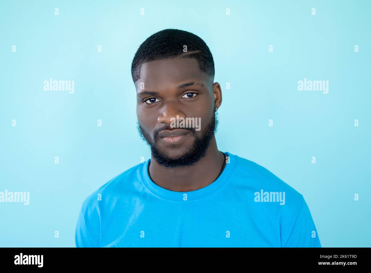 man face studio portrait handsome calm emotion Stock Photo - Alamy