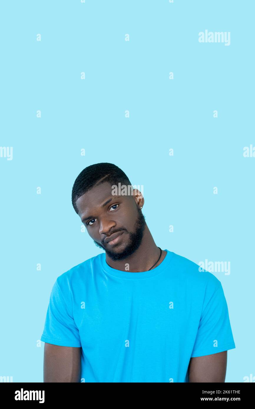 serious guy studio portrait skeptic expression Stock Photo - Alamy