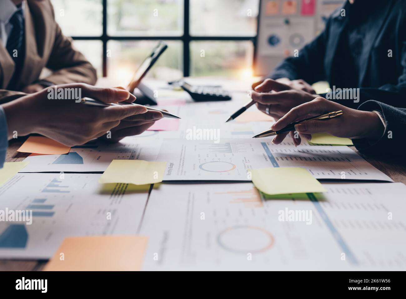 Business teamwork analyzing future digital marketing strategies ...
