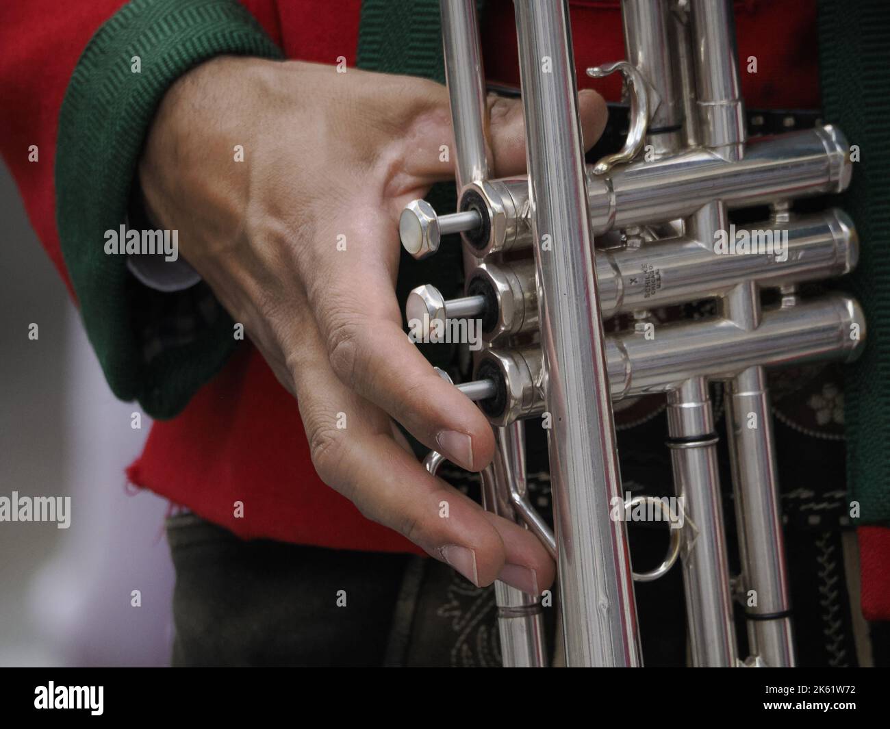 hands playing trumpet detail in a band Stock Photo - Alamy