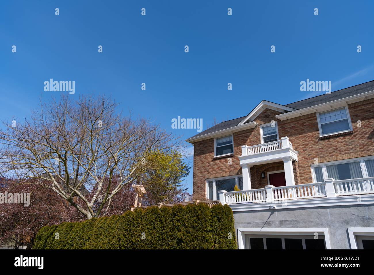 Mansion house on blue sky. Suburb architecture. Suburban housing Stock ...