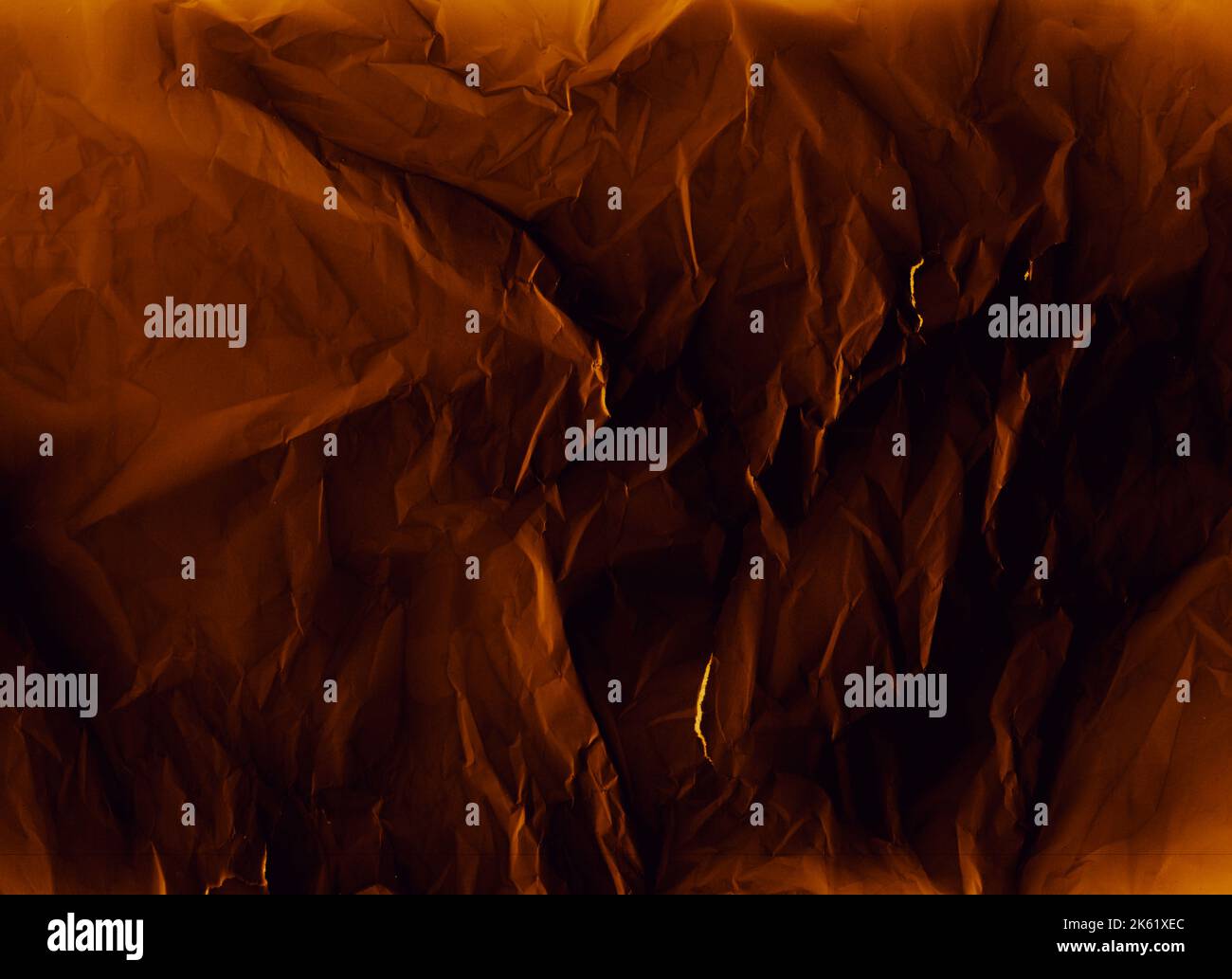 wrinkled texture distressed paper orange black Stock Photo - Alamy