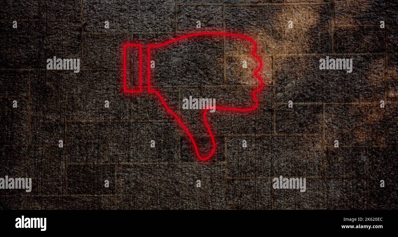Composite of illuminated red dislike button icon against old grunge ...
