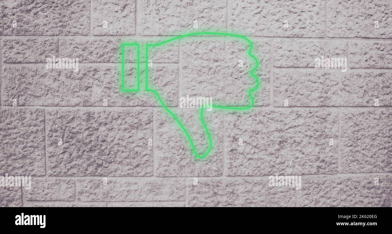 Composite of illuminated digital green dislike button icon against gray ...