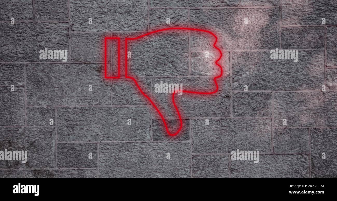 Composite of illuminated digital red dislike button icon against gray ...