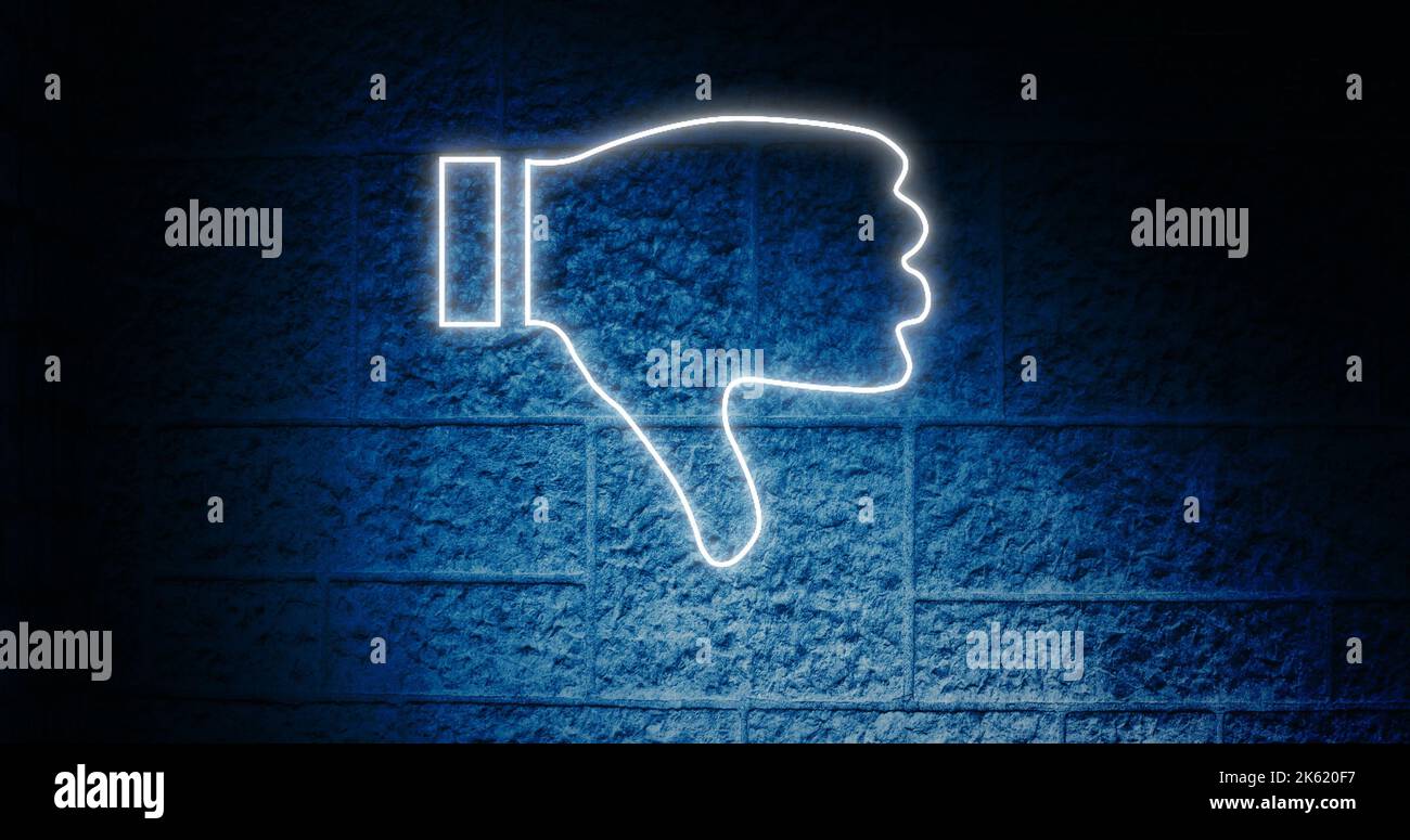 Composite of glowing dislike button icon against blue wall, copy space ...