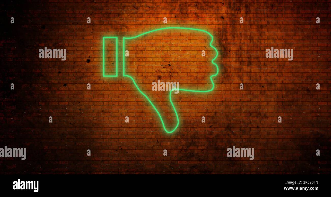 Composite of illuminated green dislike button icon against grunge brick ...