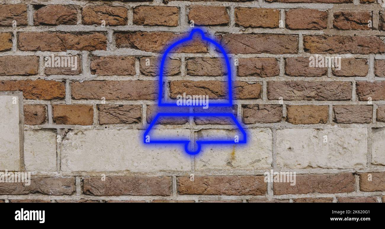Composite of digital blue notification bell icon glowing against brick ...