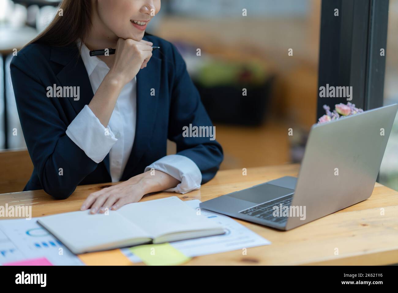 Consult financial concept. Business man pointing at paperwork and using ...