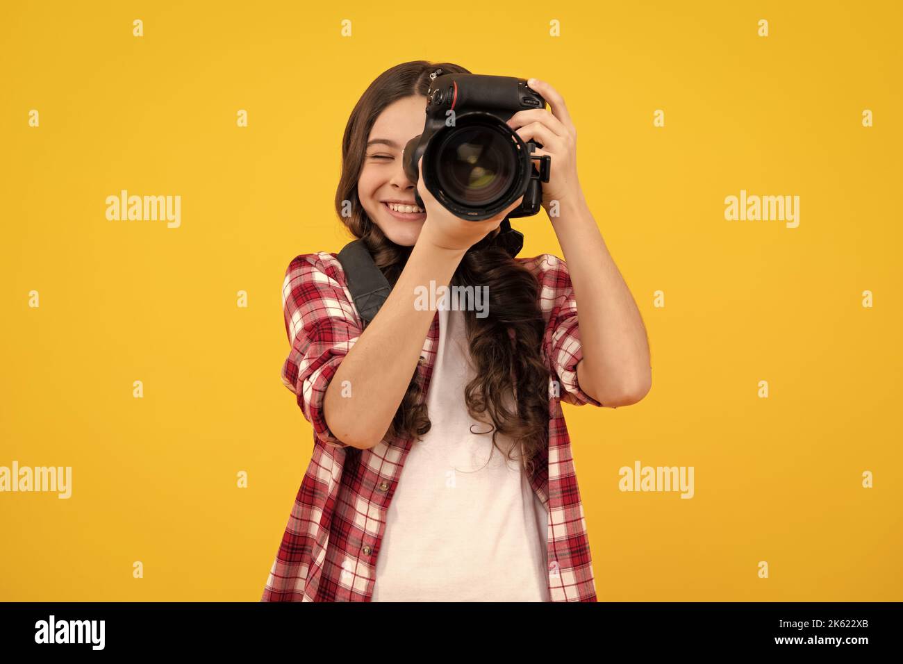 Teenager lifestyle, teen hipster hold professional camera. Girl with ...