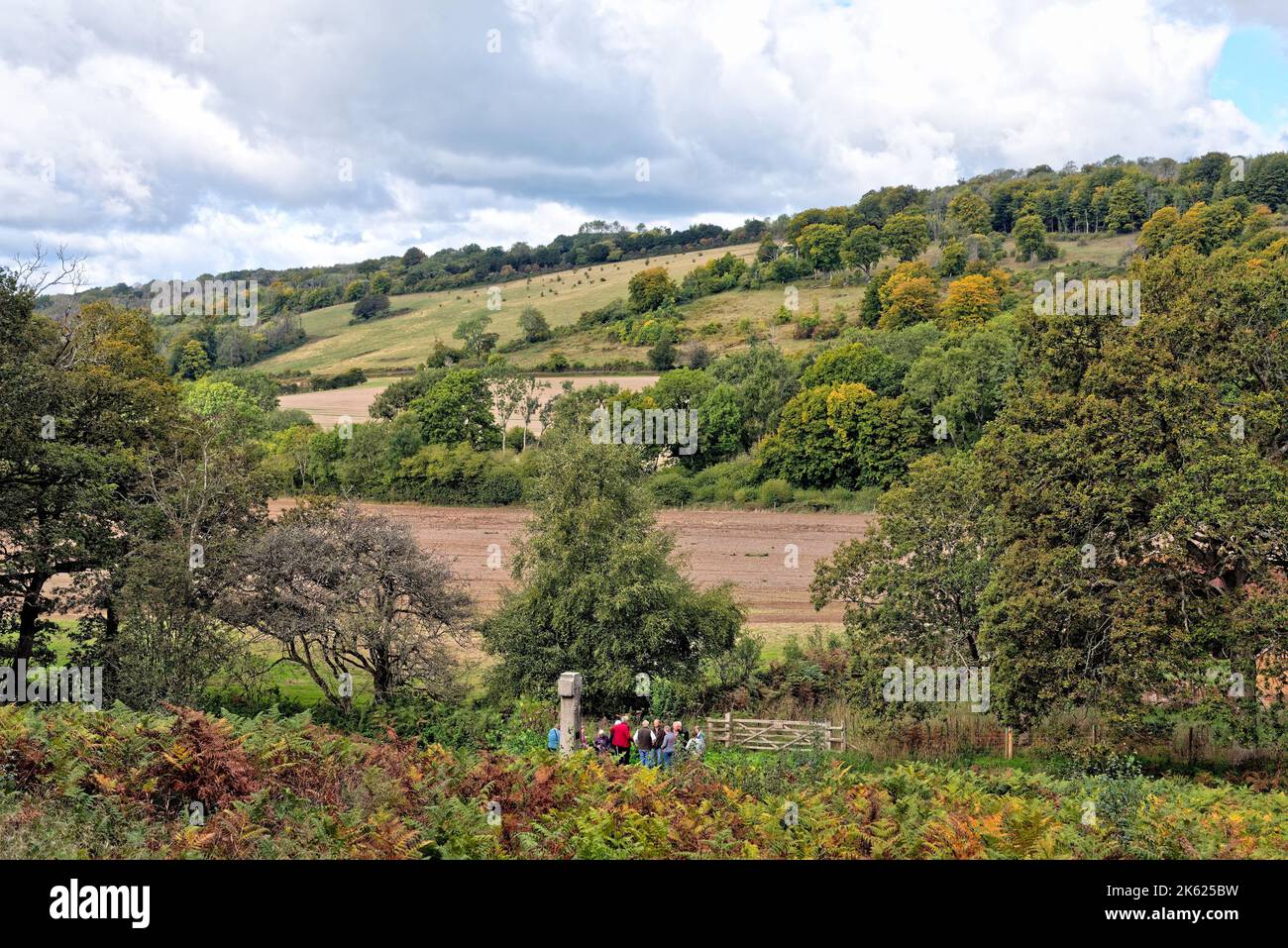 A group of elderly walkers standing by the Samuel Wilberforce memorial ...