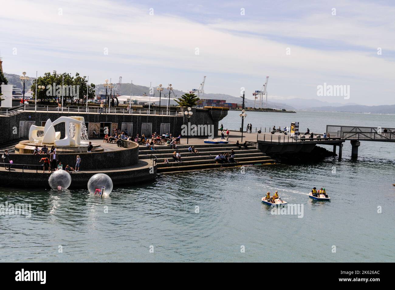 Children having fun inside a water walking bubble on the Whairepo ...