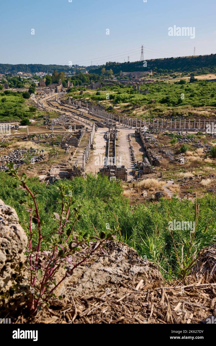 Aerial of columned street in the ruins of the Roman city of Perge ...