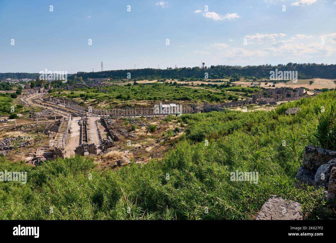 Aerial of columned street in the ruins of the Roman city of Perge ...