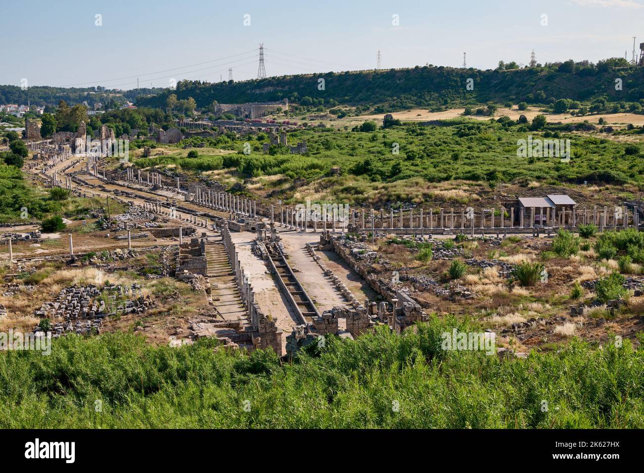 Aerial of columned street in the ruins of the Roman city of Perge ...