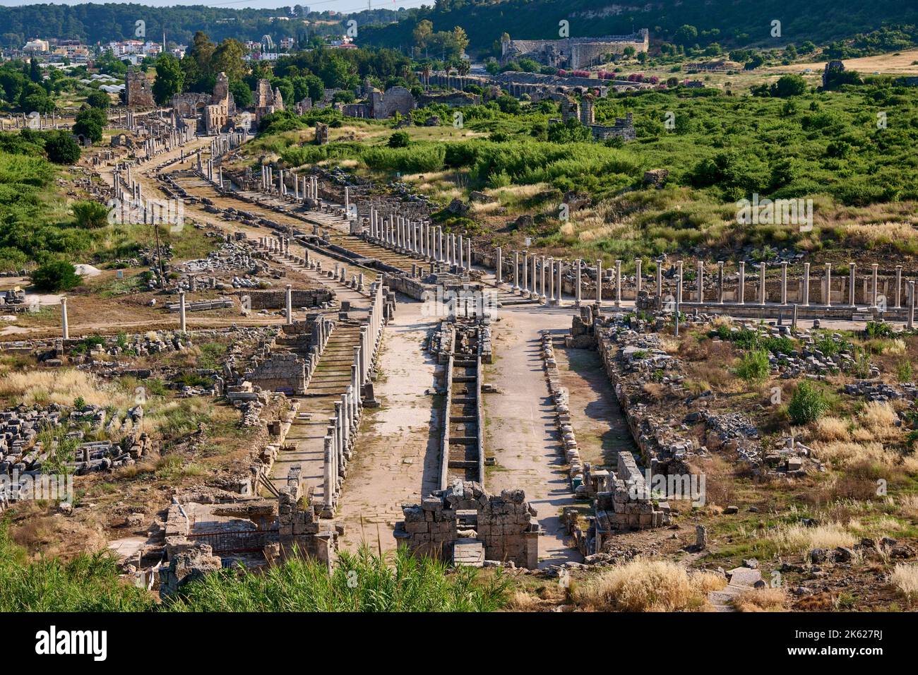 Aerial of columned street in the ruins of the Roman city of Perge ...