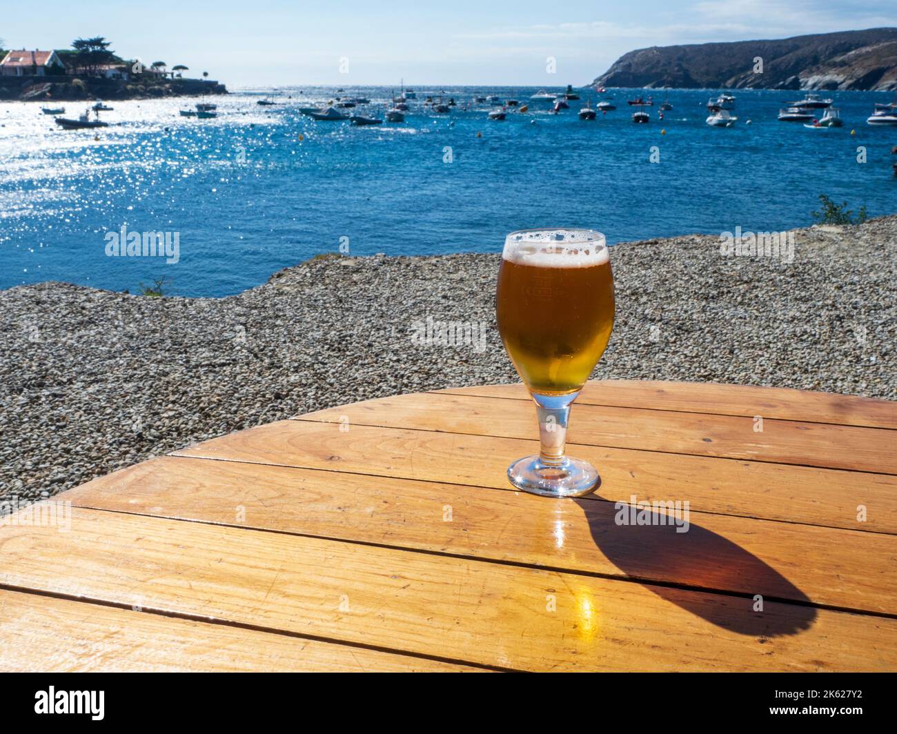 A glass of beer in a bar in Cadaques harbour Stock Photo - Alamy