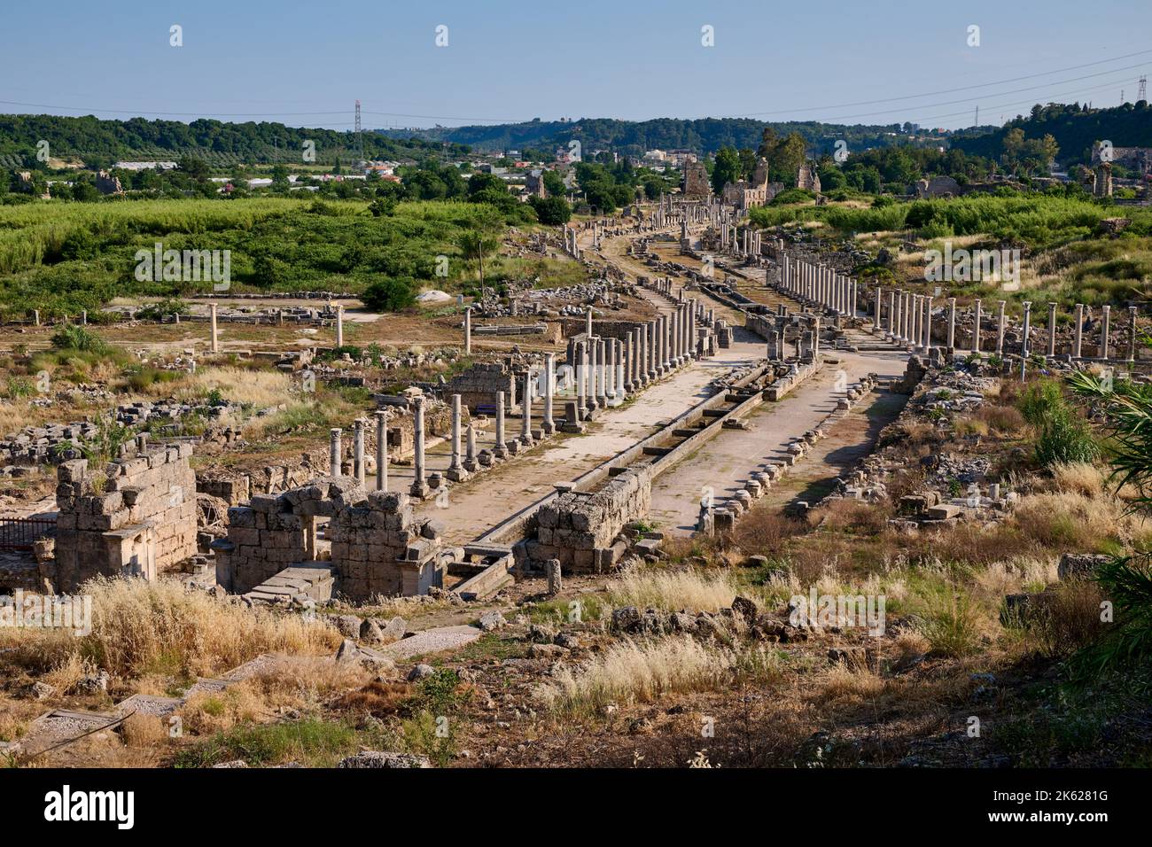Aerial of columned street in the ruins of the Roman city of Perge ...