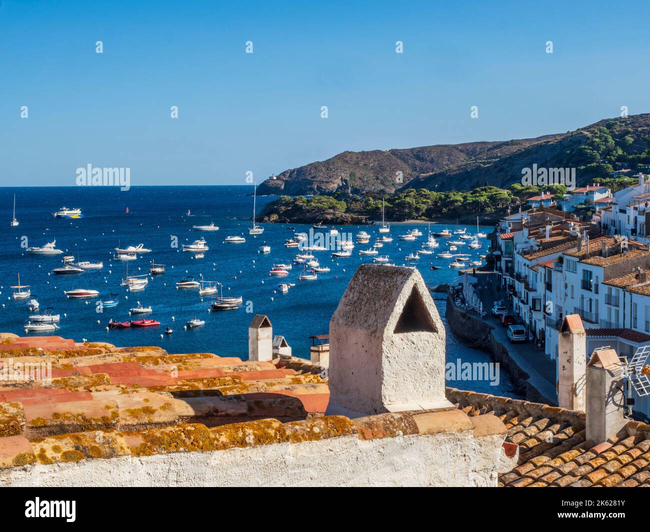 View of the bay of Cadaqués filled with boats Stock Photo - Alamy