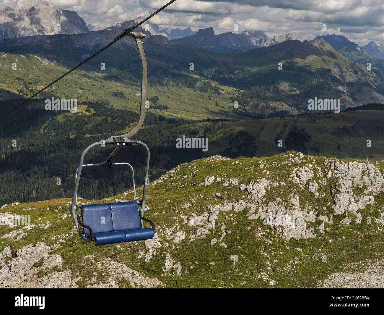 chair cable lift in dolomites mountains Stock Photo - Alamy