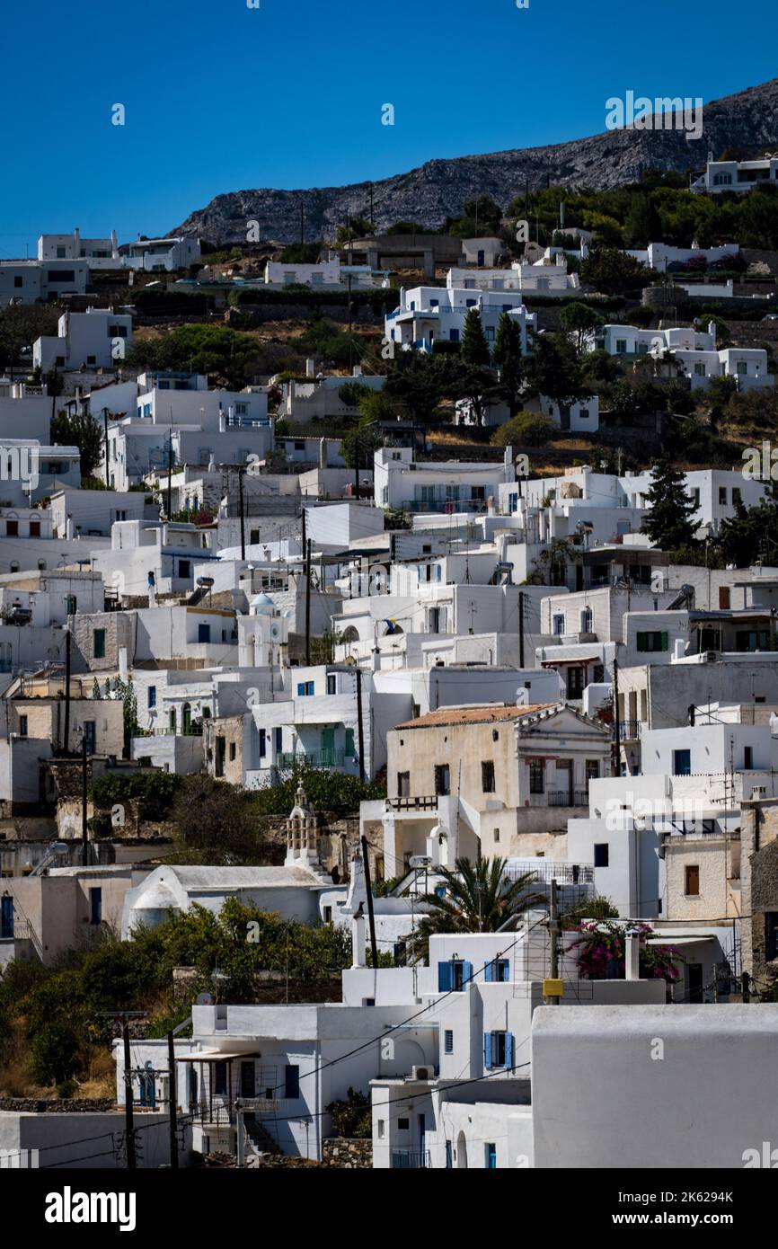 A vertical shot of houses along the side of a mountain Stock Photo - Alamy