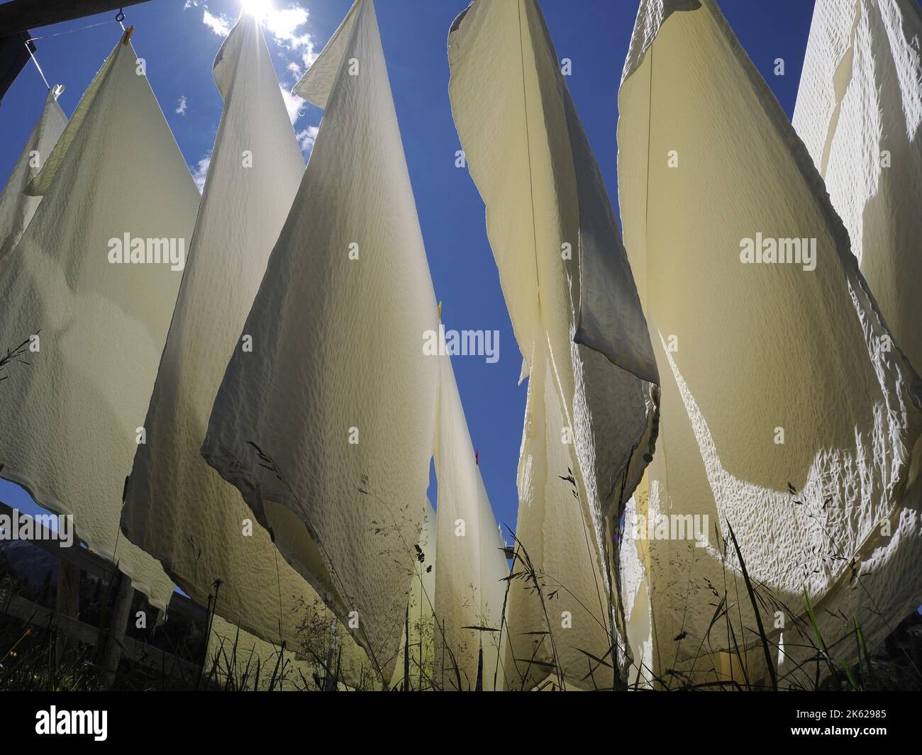 Bed sheets drying hi-res stock photography and images - Alamy