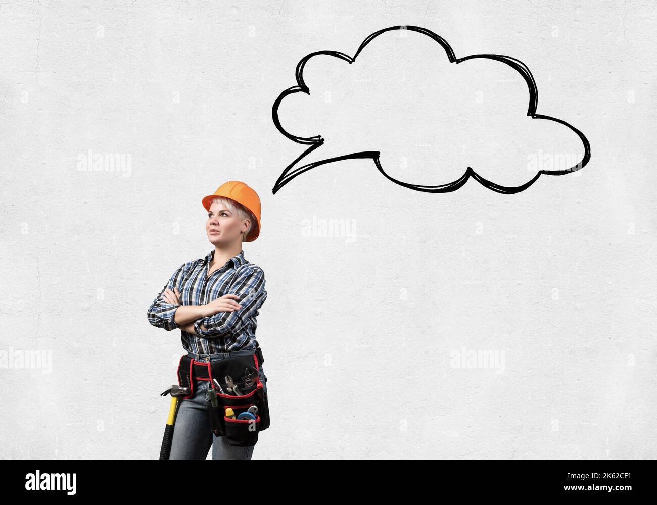 Confident female worker in safety helmet Stock Photo - Alamy