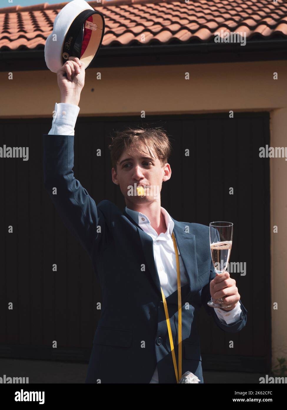 A newly graduated Swedish student celebrating his high school ...