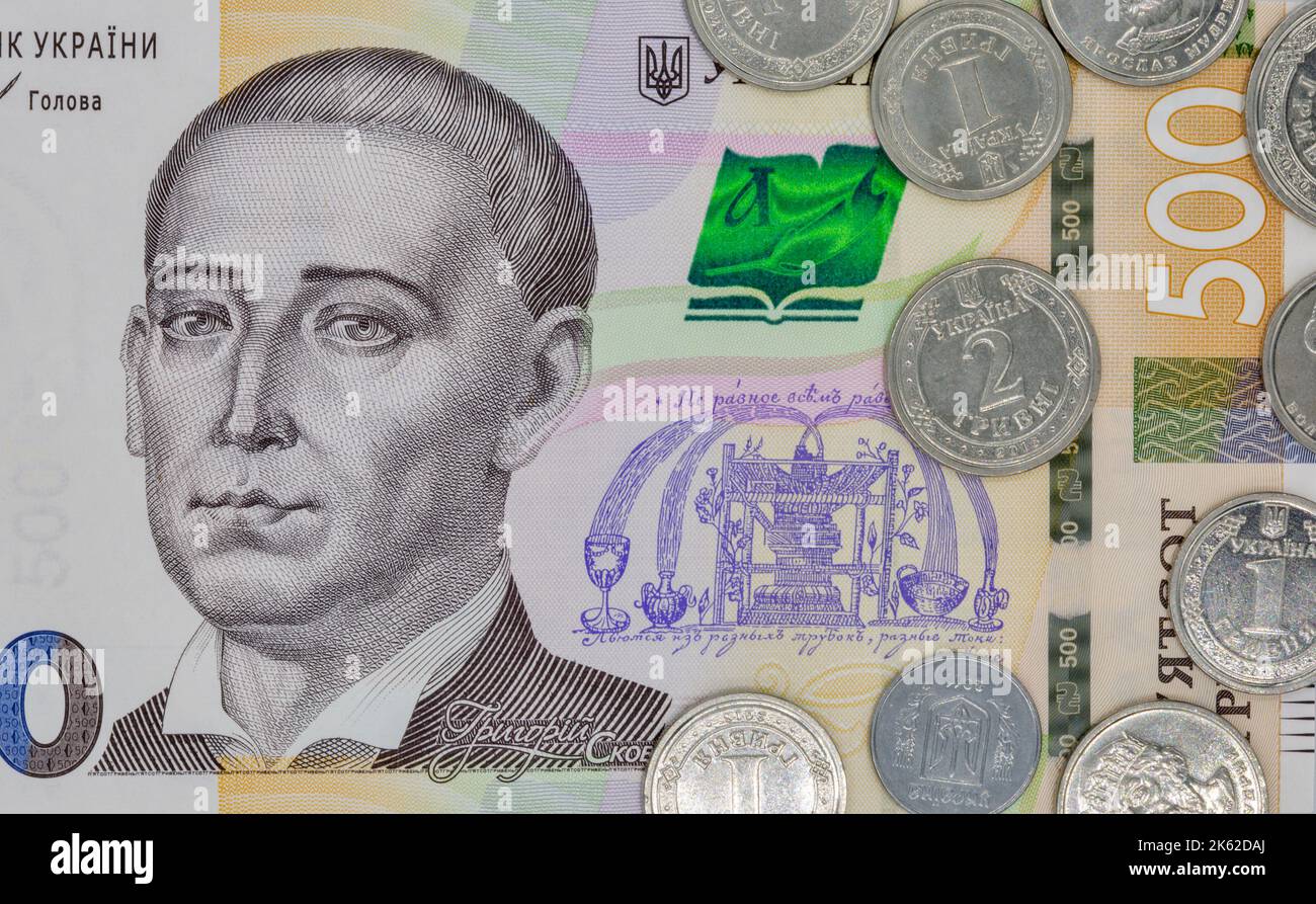 five hundred ukrainian hryvna banknote and coins closeup with portrait ...